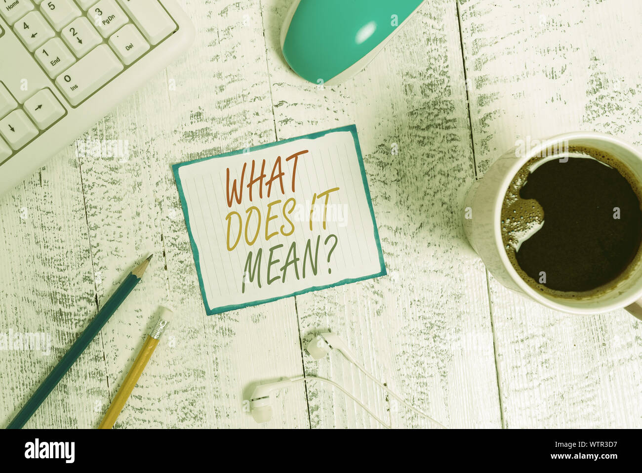 Writing note showing What Does It Mean question. Business concept for ...