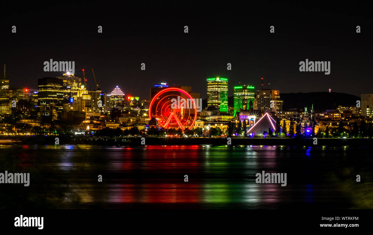 Skyline of old montreal at night from old port hi-res stock photography ...