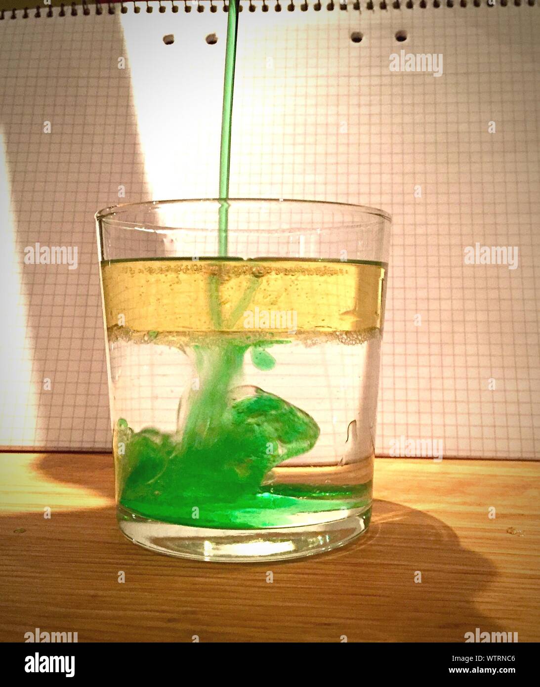 Pouring oil in water hi-res stock photography and images - Alamy