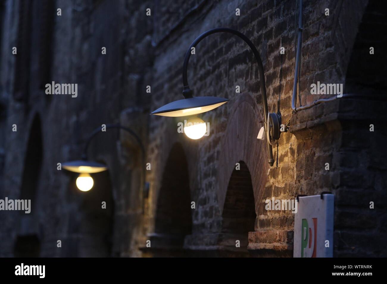 Old brick wall illuminated hi-res stock photography and images - Alamy