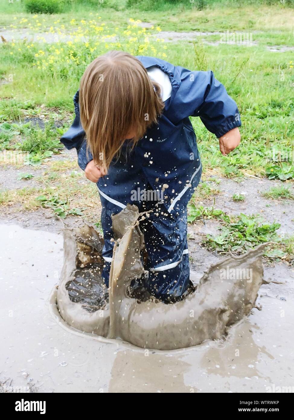 Splashing puddle looking down hi-res stock photography and images - Alamy