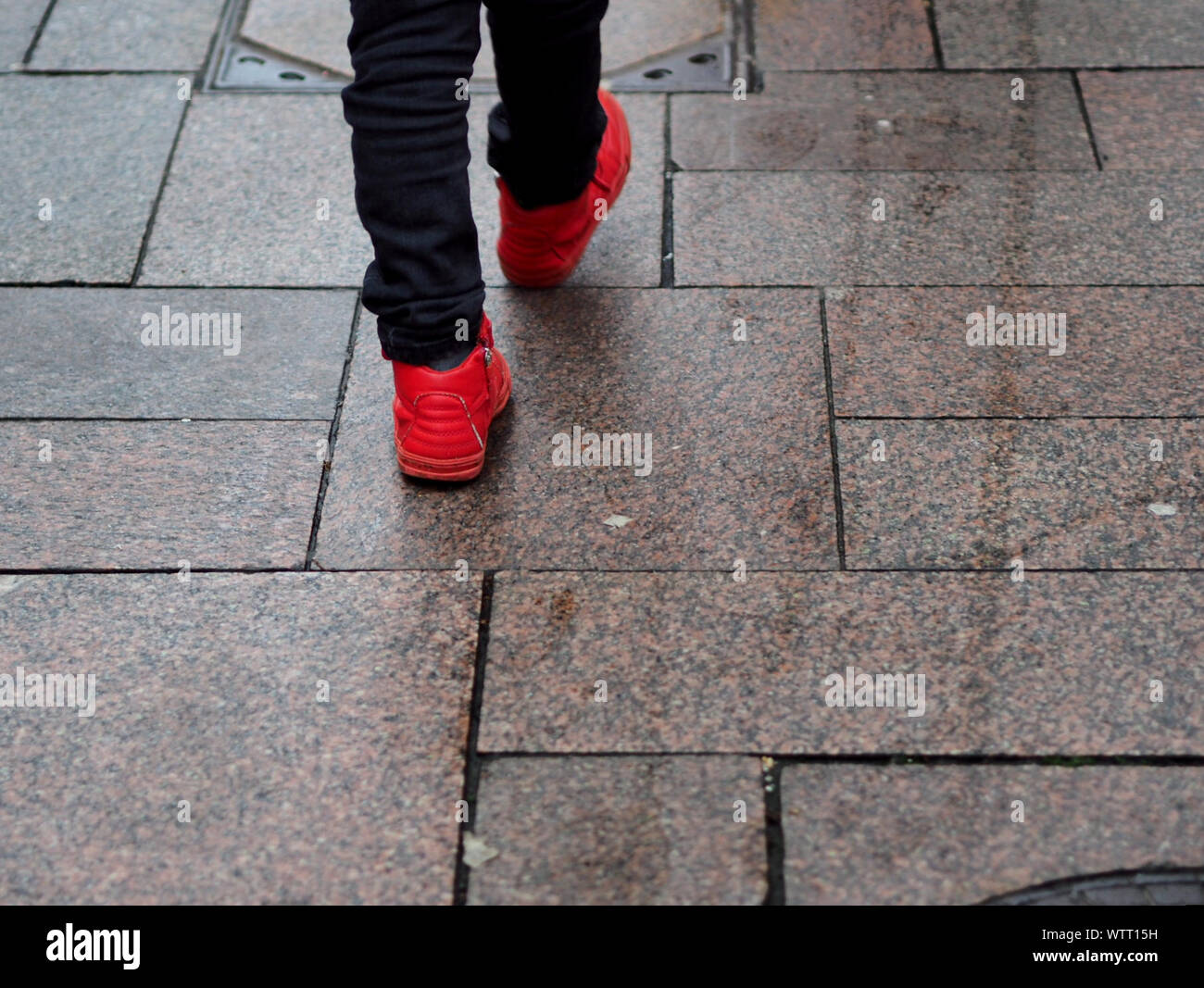 Man walking on paving hi-res stock photography and images - Alamy