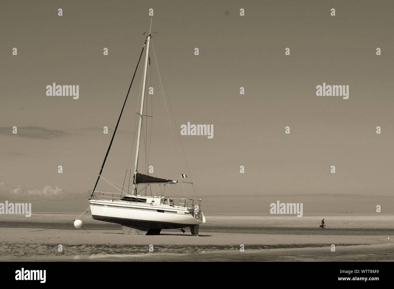 Sailing Boat On Beach Stock Photo - Alamy