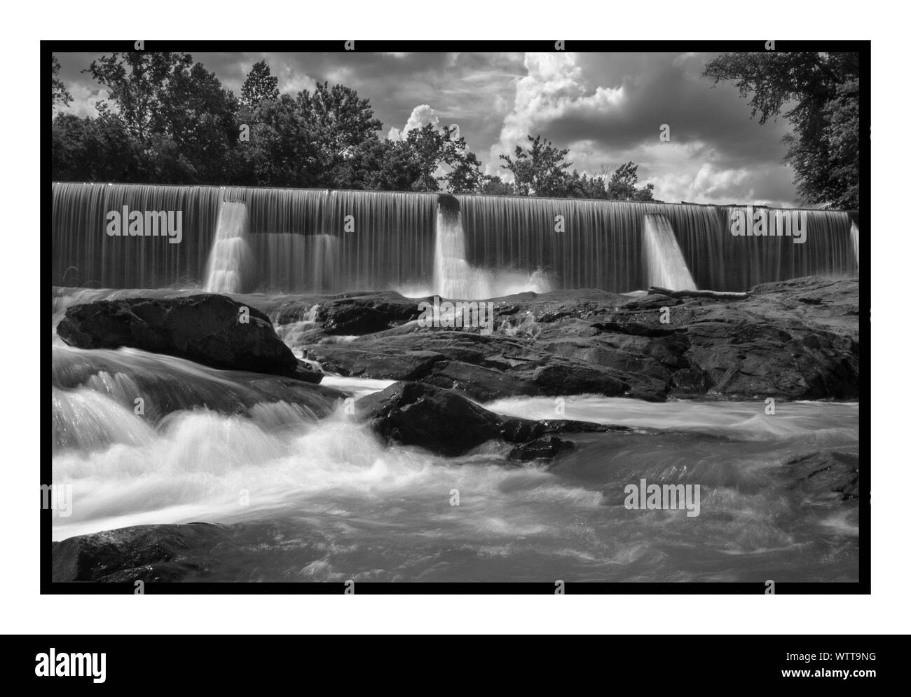 Water Flowing Over Spillway Of Dam Stock Photo - Alamy