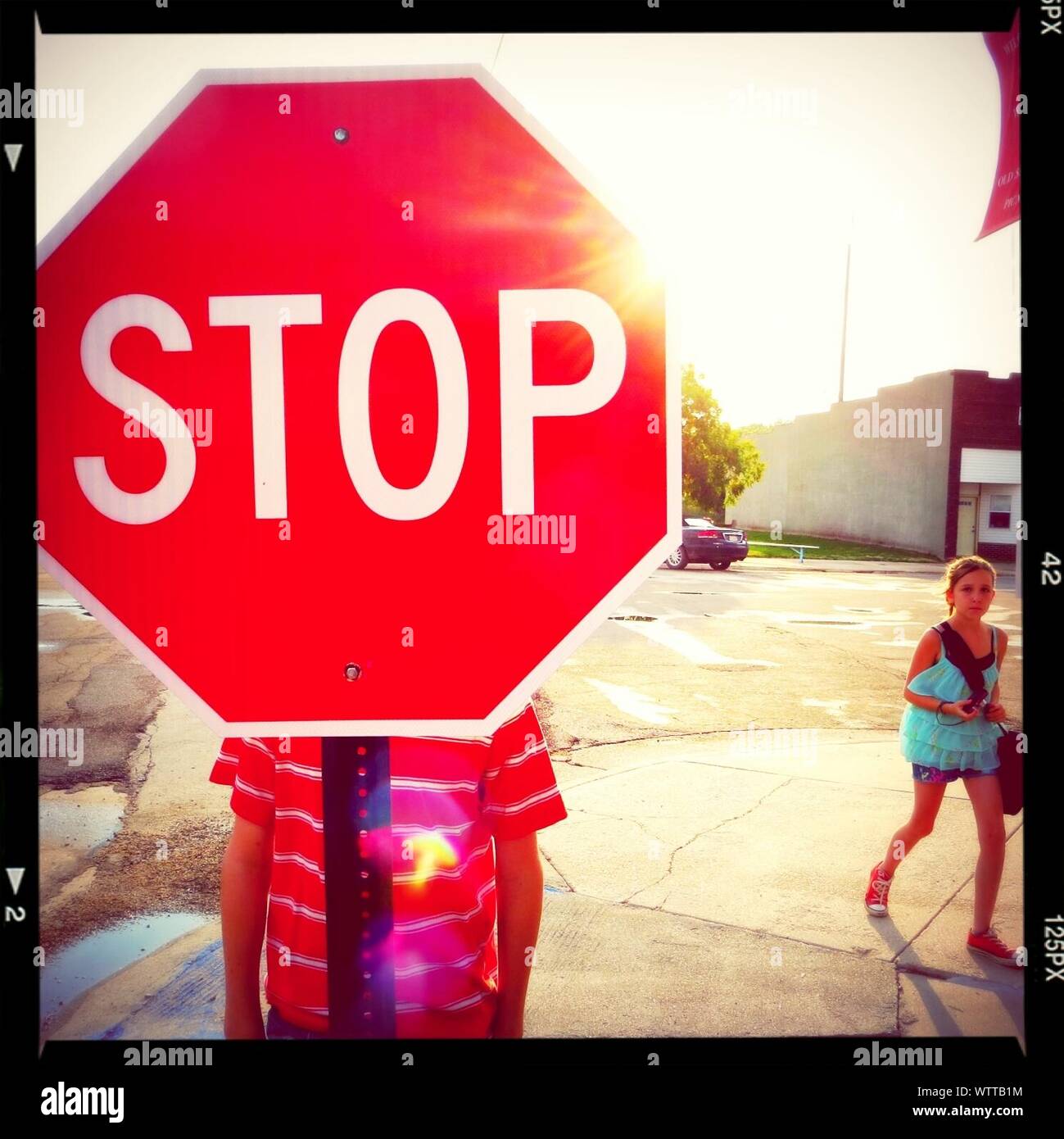 Standing Behind Sign High Resolution Stock Photography and Images - Alamy