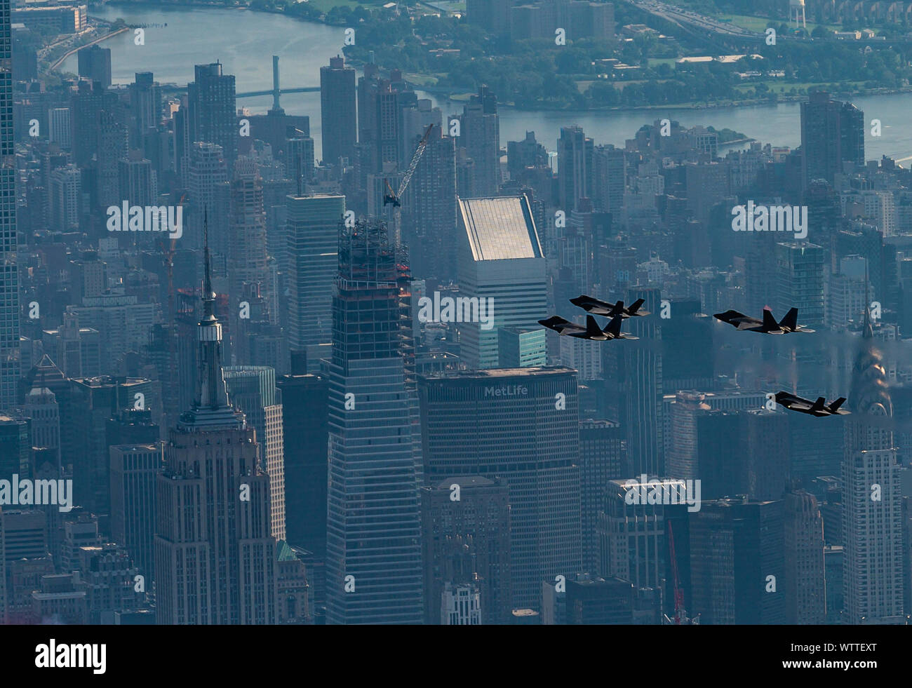 The U.S. F-35A and F-22 Raptor Demo Teams fly in formation over ...