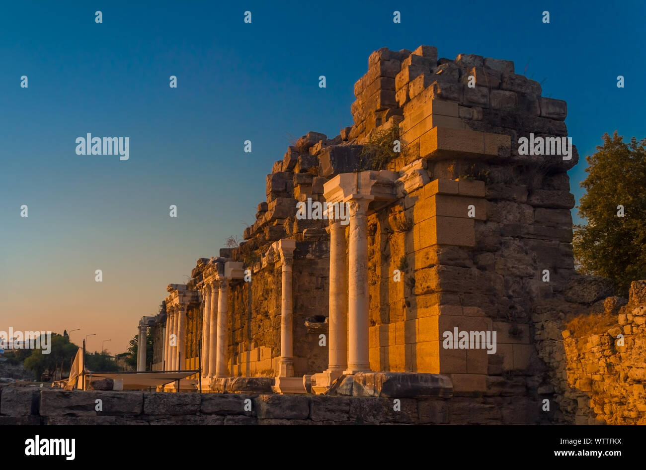 Ancient ruins in Side (Turkey) at sunset Stock Photo - Alamy