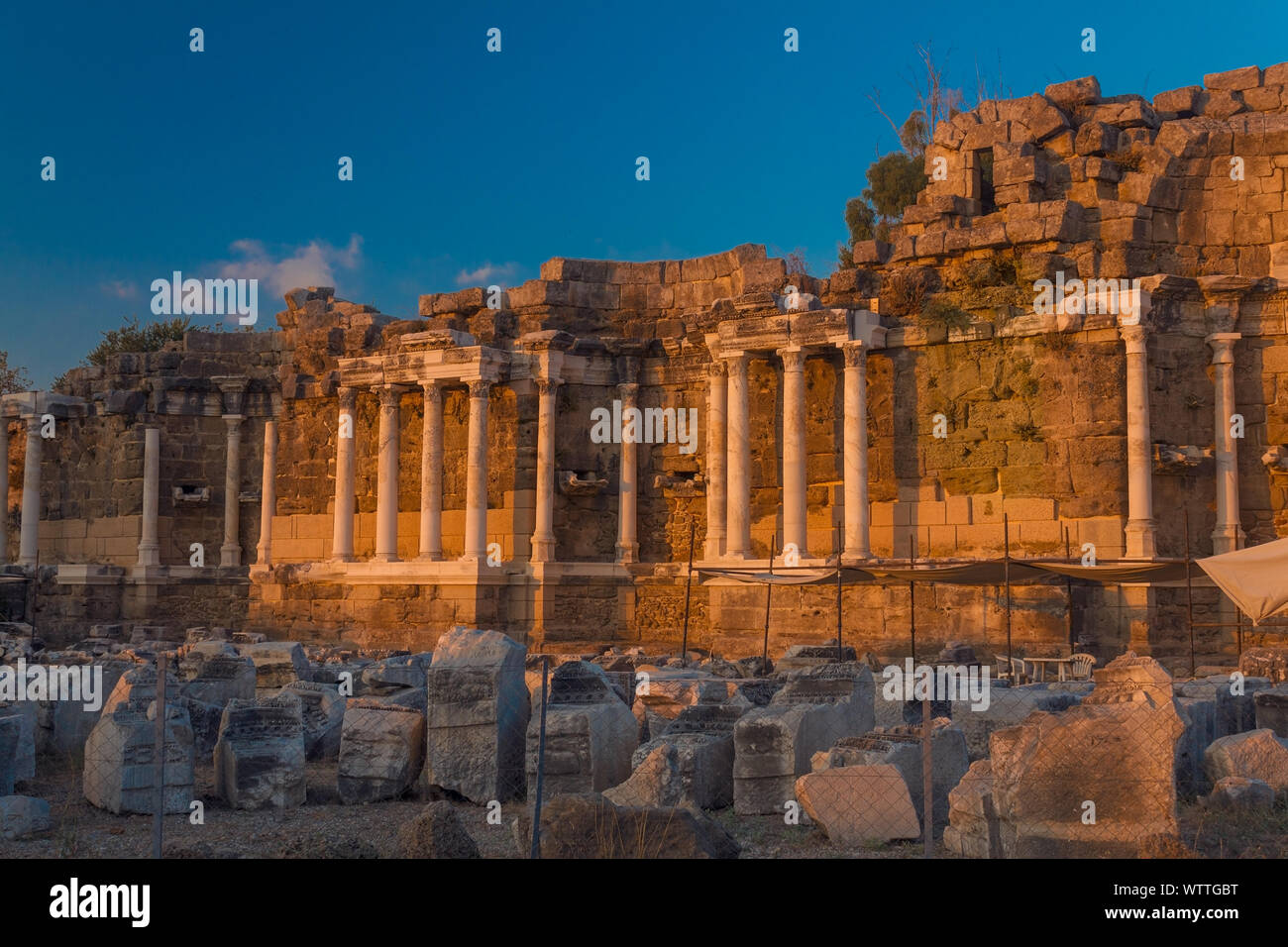 Ancient ruins in Side (Turkey) at sunset Stock Photo - Alamy