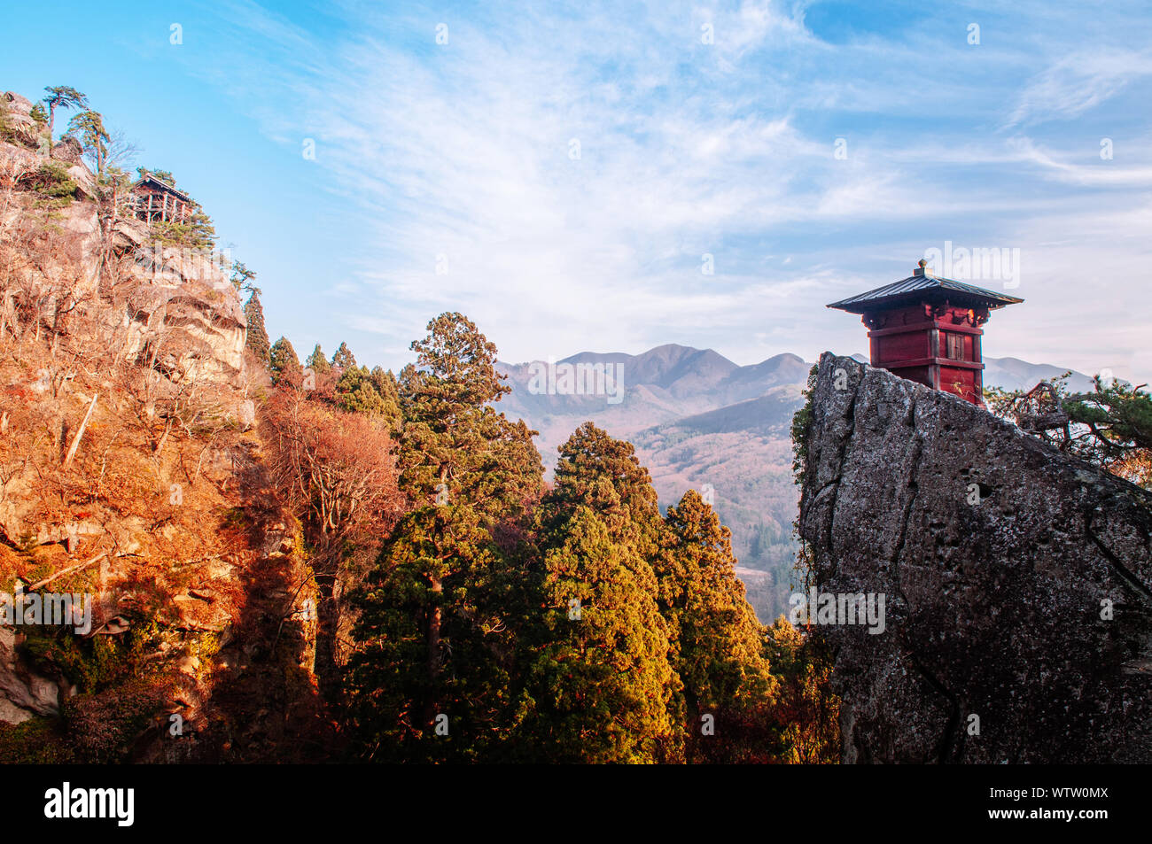 Nokyodo red sutra repository building on rock cliff in evening at ...