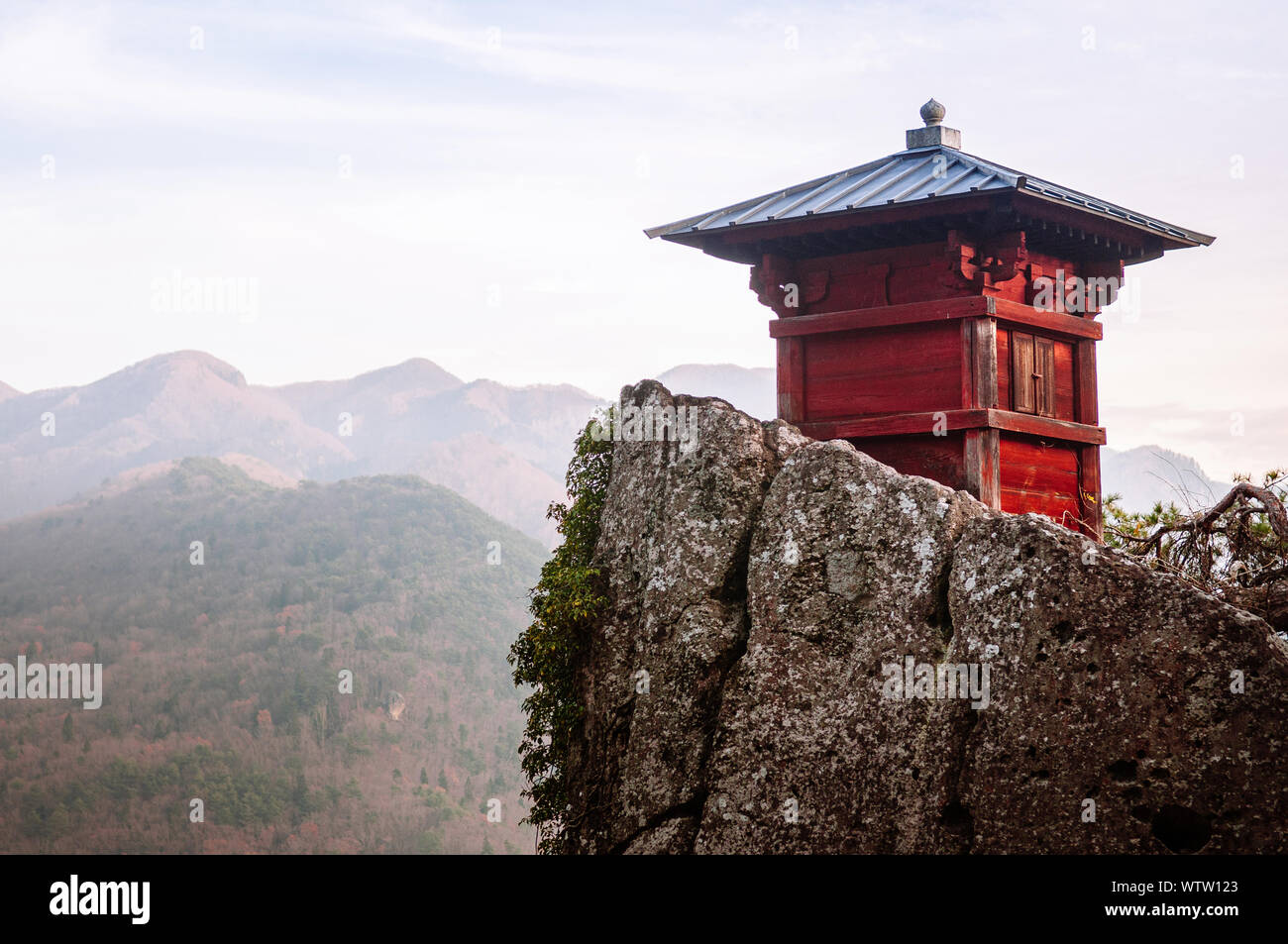 Nokyodo red sutra repository building on rock cliff in evening at ...