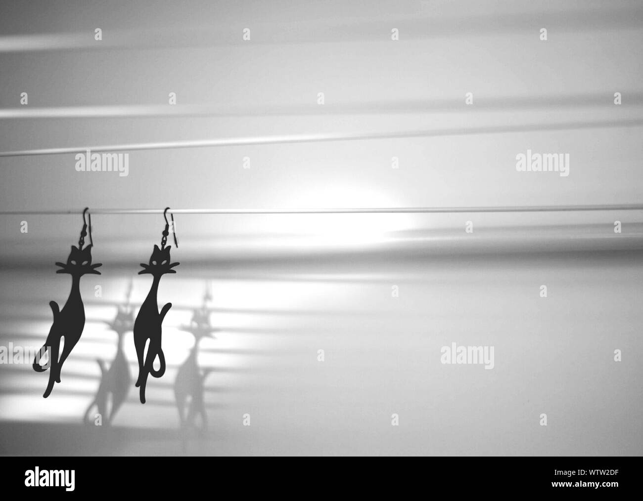 Hanging earrings hi-res stock photography and images - Alamy