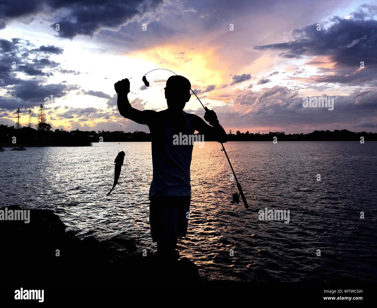 Fisherman with rod hi-res stock photography and images - Alamy