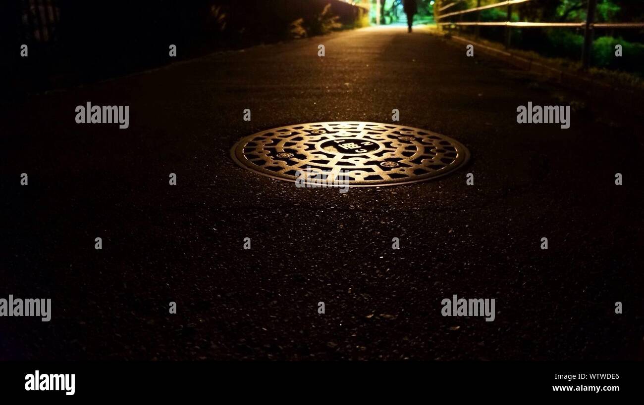 Manhole street night high angle view High Resolution Stock Photography ...