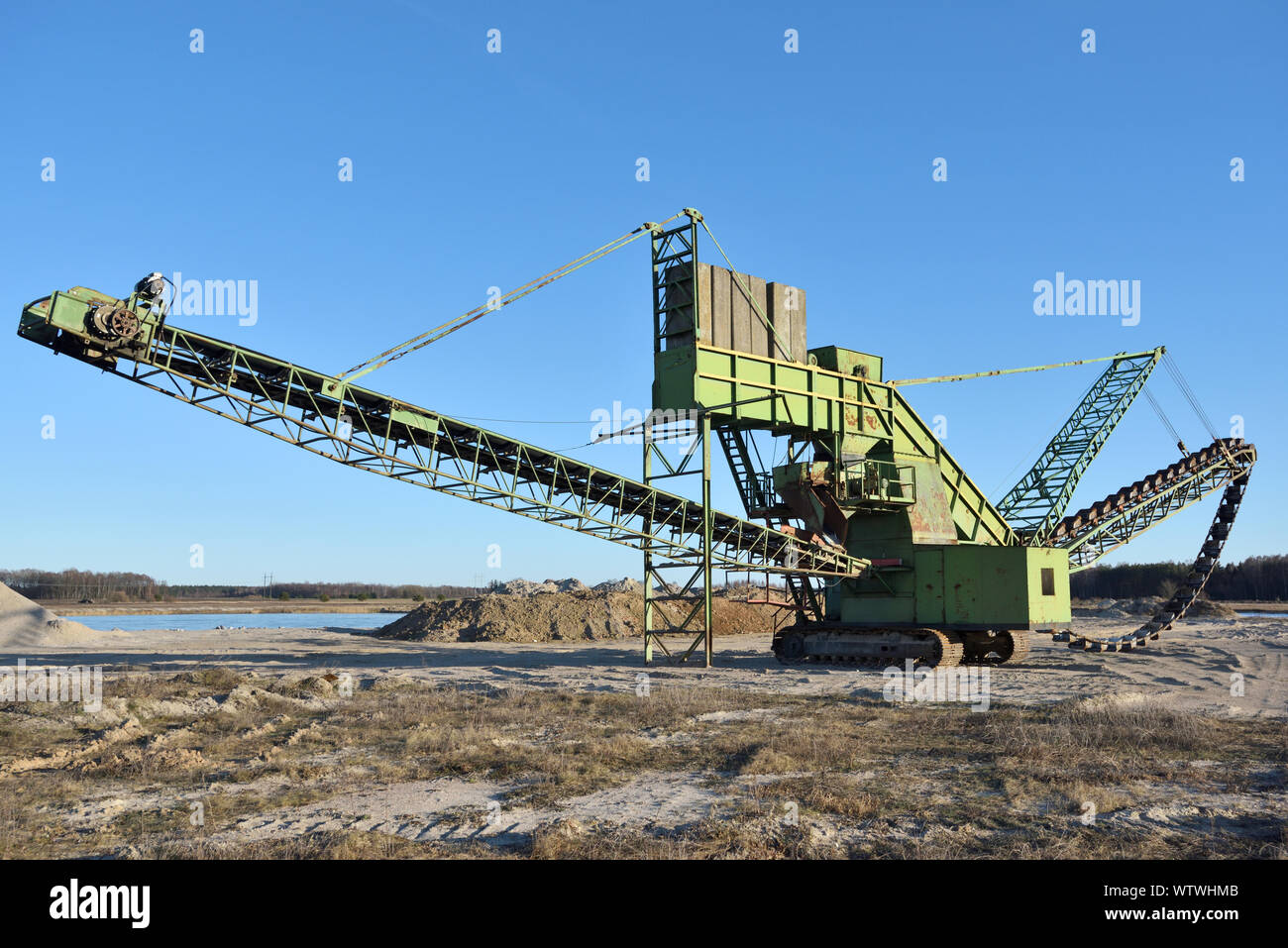 Stone crusher in the quarry. Working mining machine - stone crusher ...