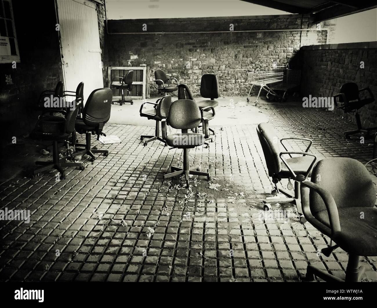 Abandoned office chairs hi-res stock photography and images - Alamy