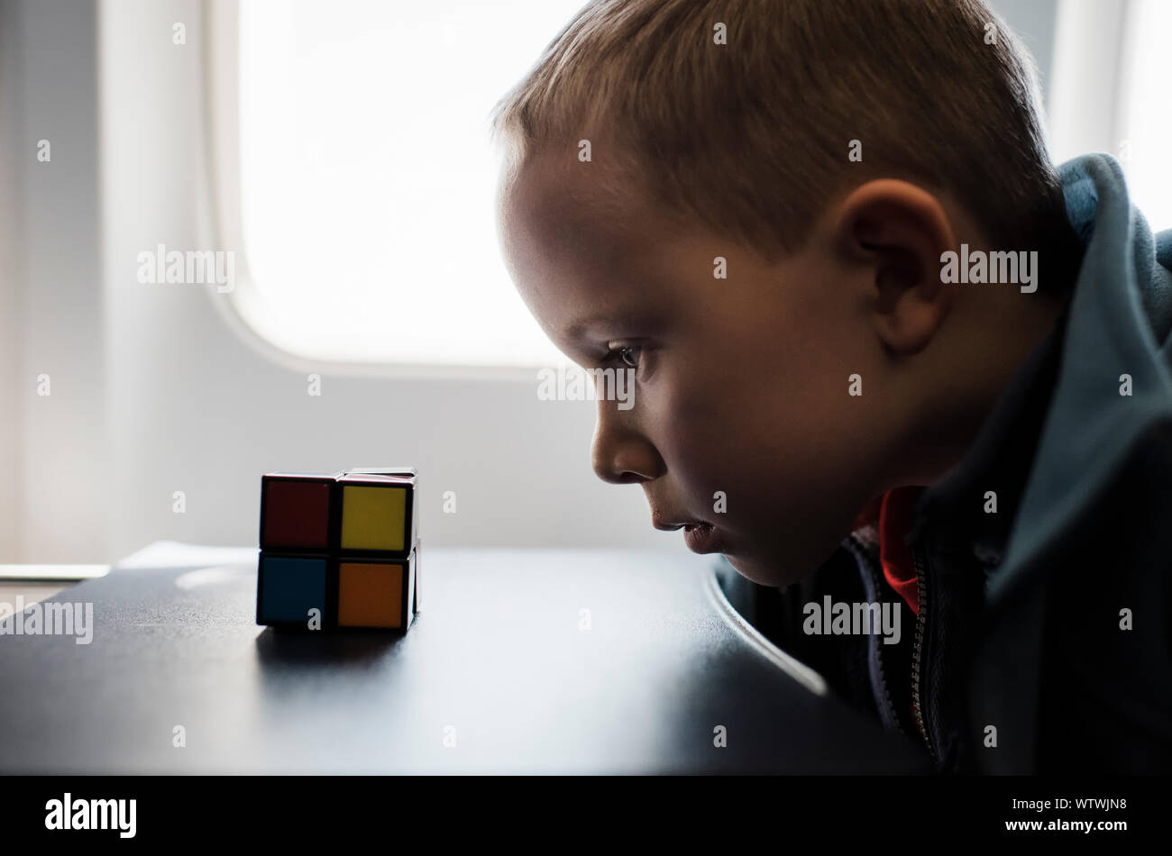 Kid rubix cube hi-res stock photography and images - Alamy
