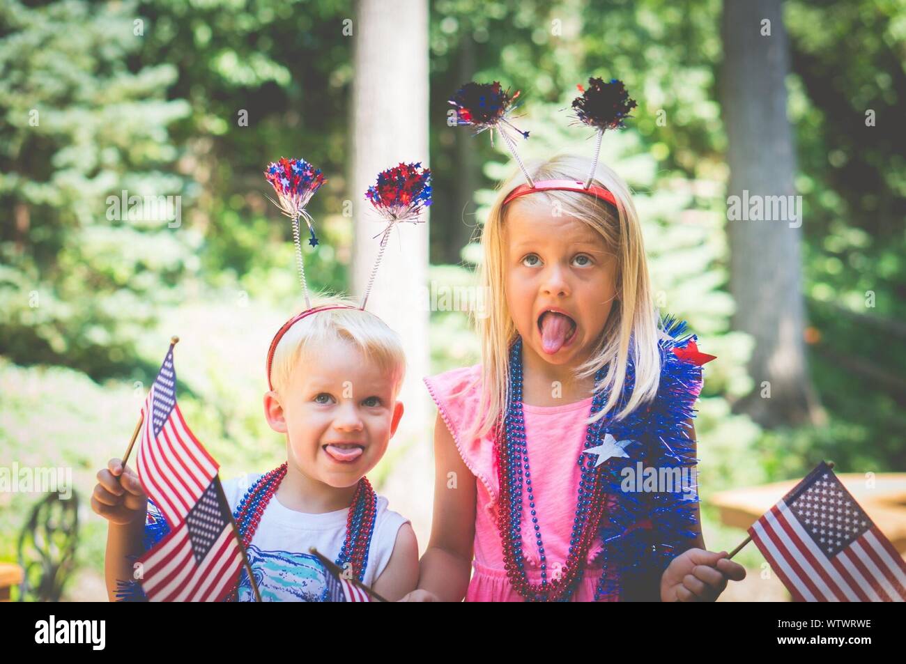 Children with flags hi-res stock photography and images - Alamy
