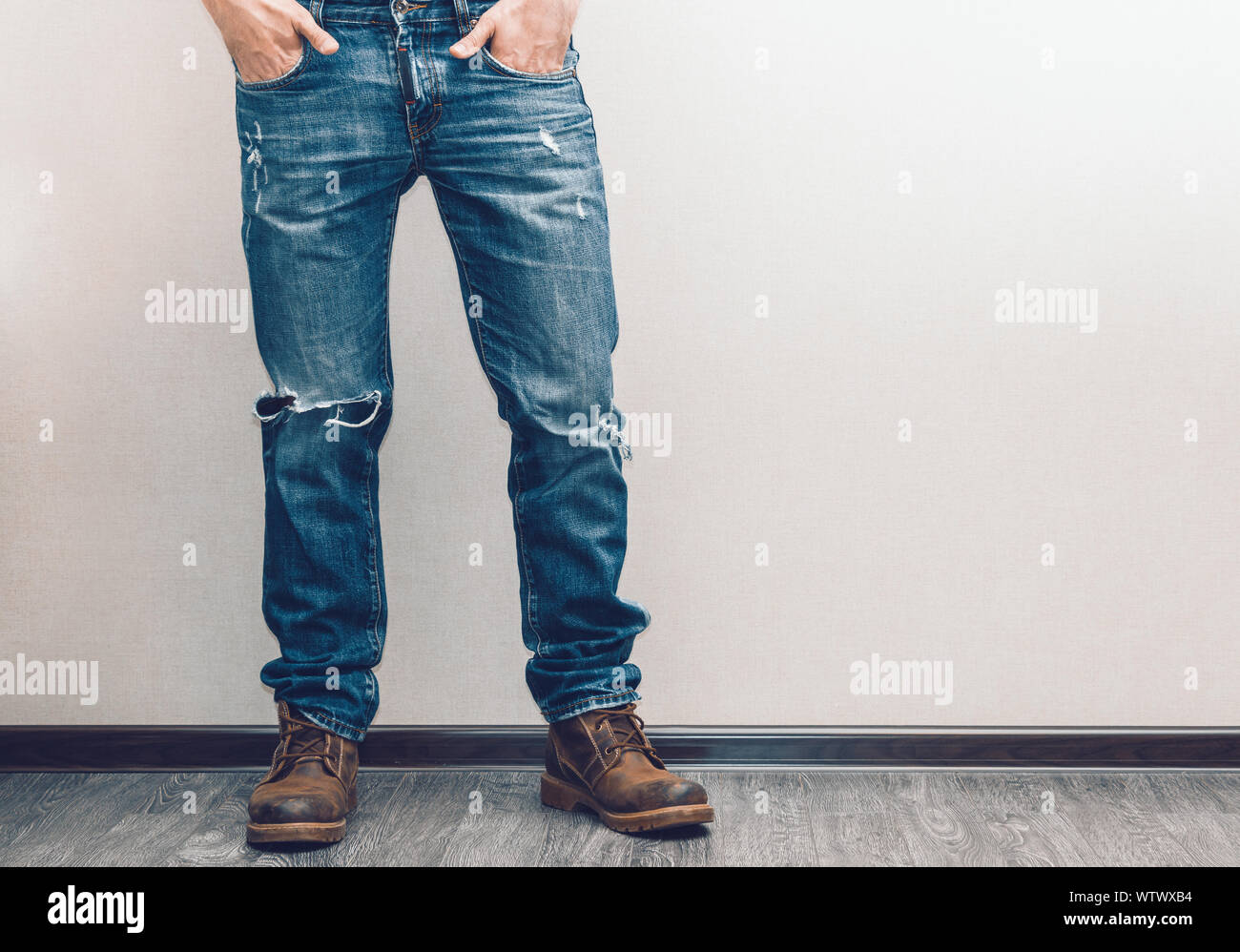 Legs man in boots jeans hi-res stock photography and images - Alamy