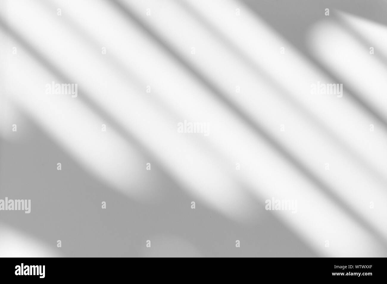 Organic drop shadow on a white wall, overlay effect for photo, mock-ups ...