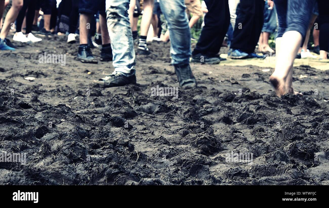 Muddy people hi-res stock photography and images - Alamy