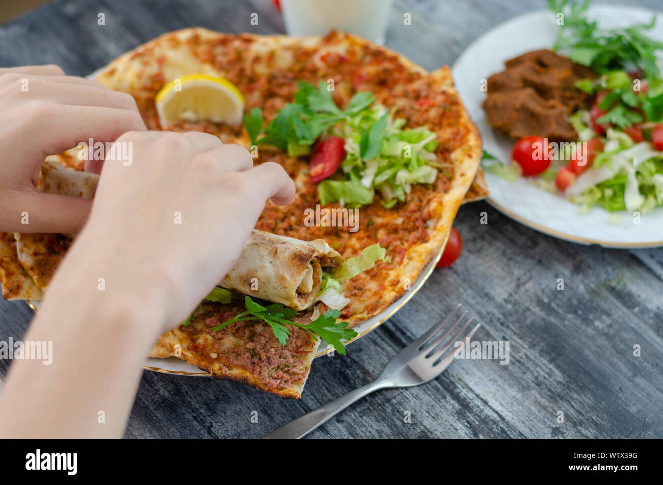 Traditional delicious Turkish food; Turkish lahmacun.top view.The ...