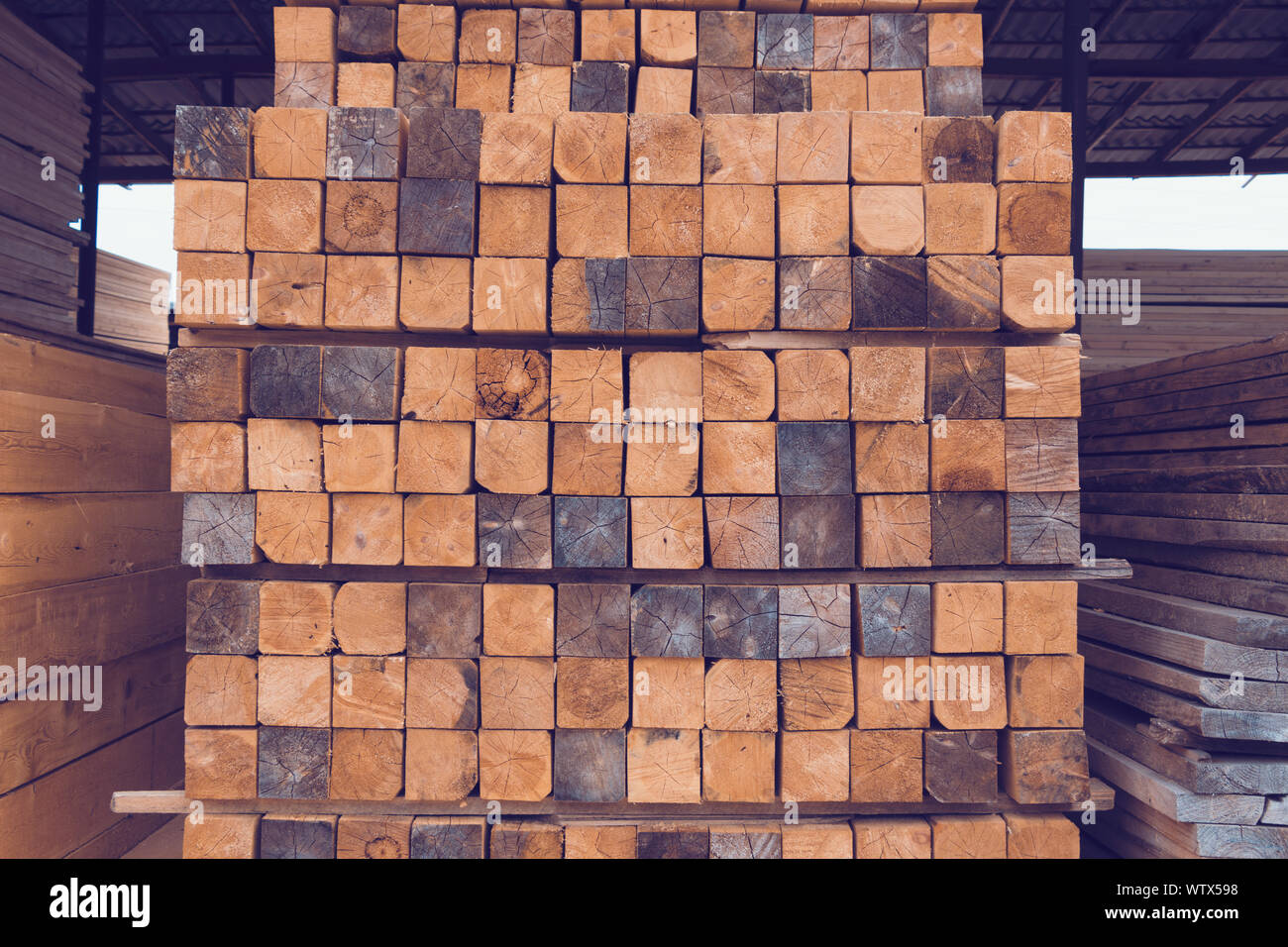 Closeup of stack of raw wooden planks Stock Photo - Alamy