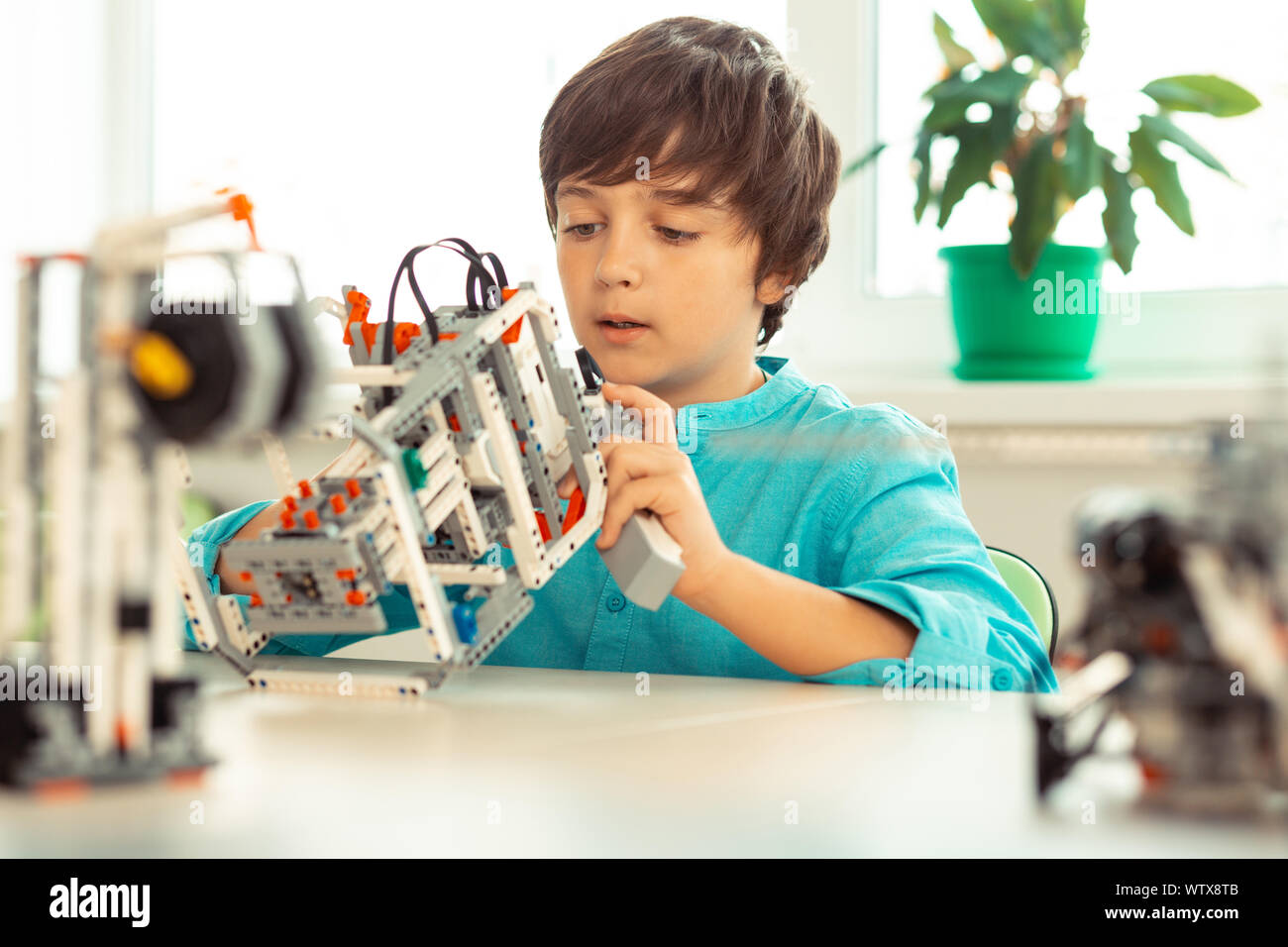Schoolboy working project science hi-res stock photography and images ...