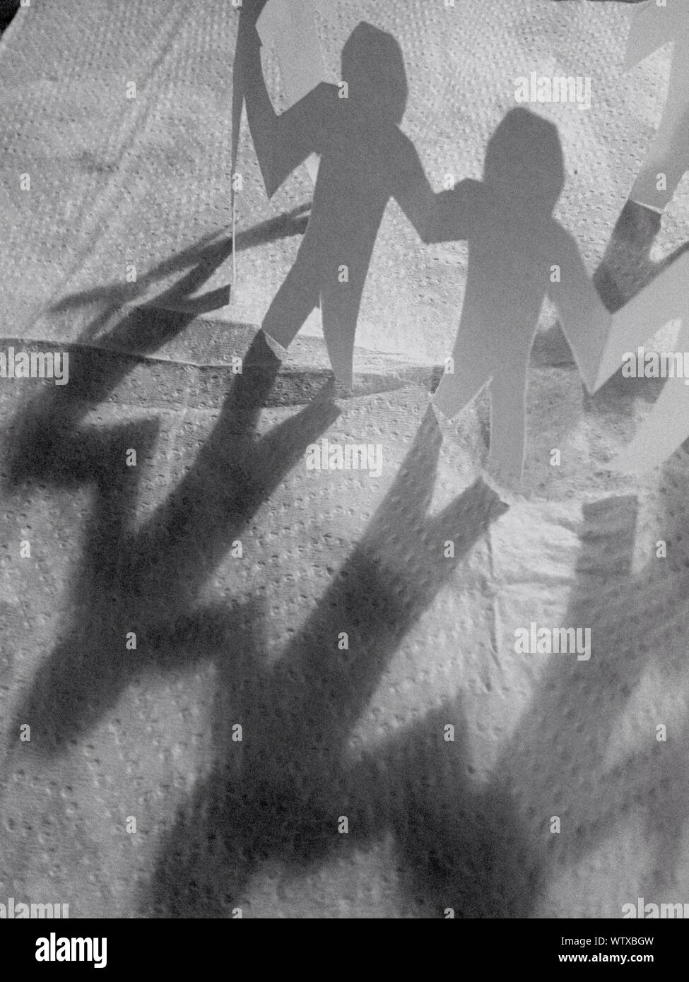 Human chain holding hands hi-res stock photography and images - Alamy