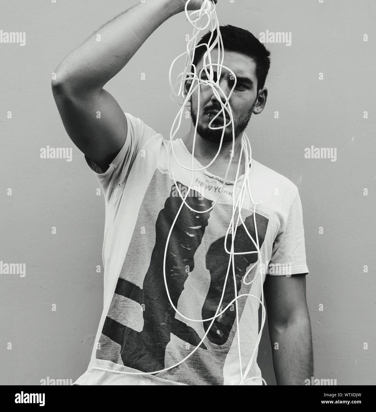 String man hi-res stock photography and images - Alamy