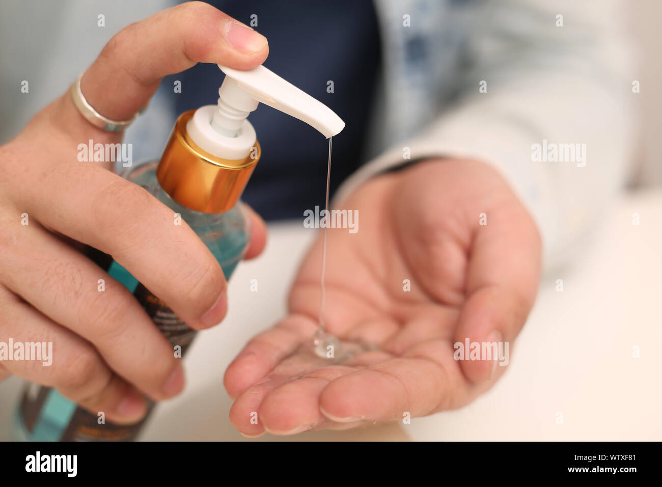 Picture of man liquid spray medicine bottle holding in hand. Isolated ...