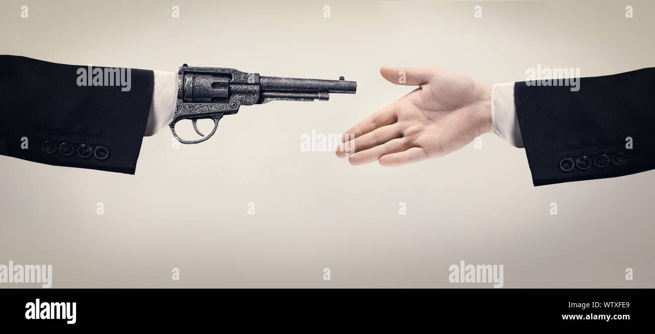 Be careful in your communication. Two male hands shaking in black suit ...