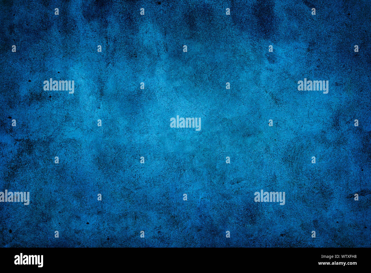 Rustic blue wall background with darker black grungy border and vintage ...