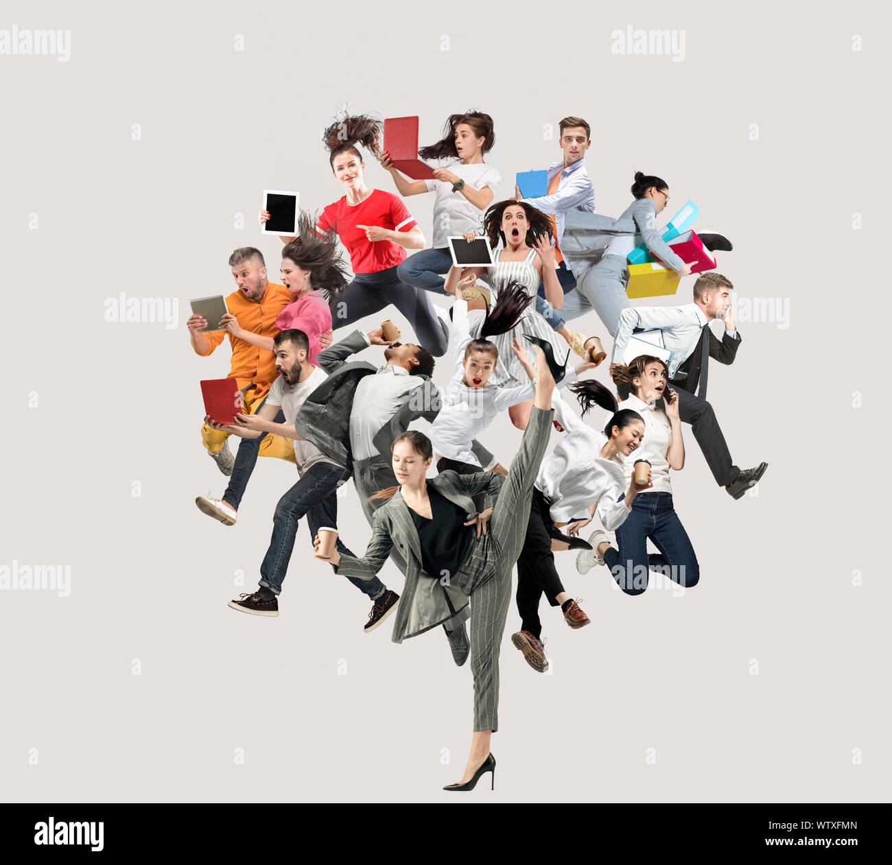 Happy office workers jumping and dancing in casual clothes or suit with ...