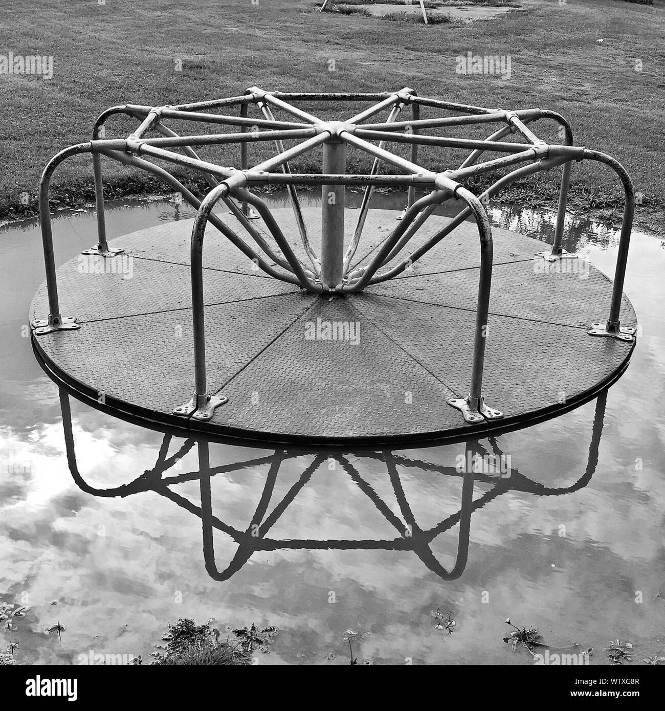 Carousel in the playground hi-res stock photography and images - Alamy