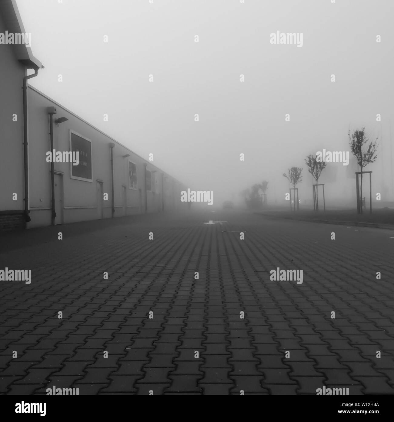 Building exterior with paving stone Black and White Stock Photos ...