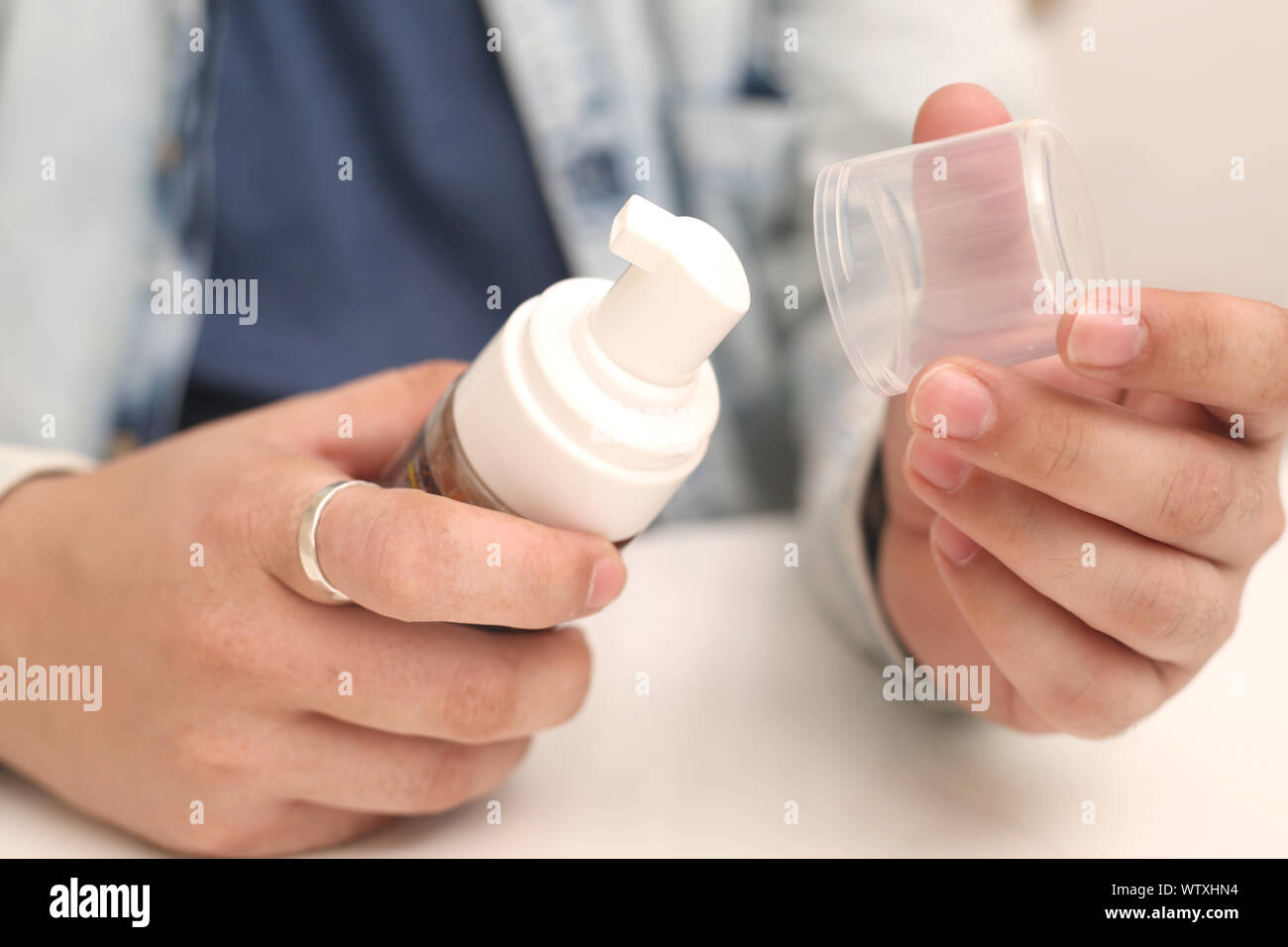 Picture of man liquid spray medicine bottle holding in hand. Isolated ...