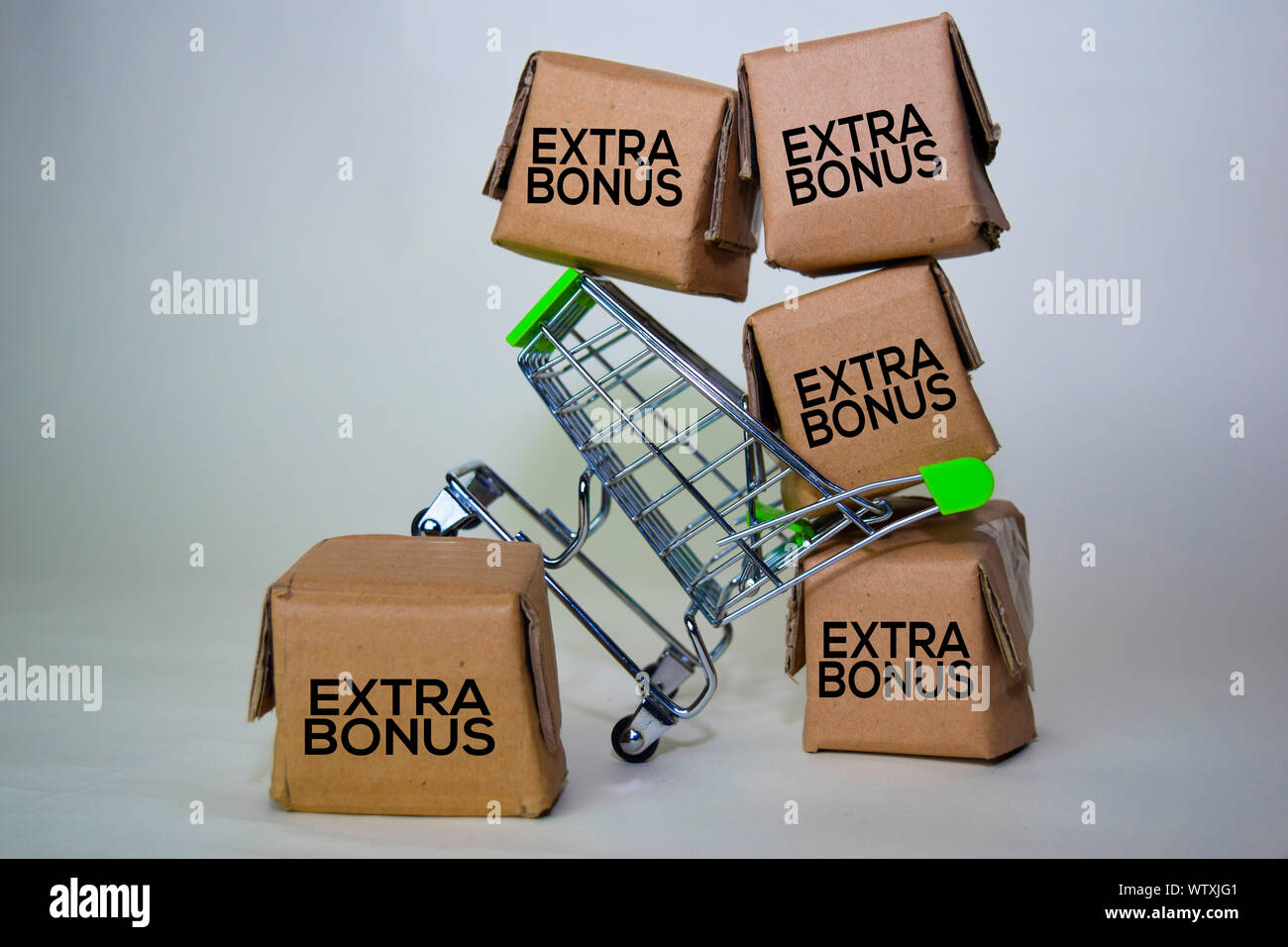 Extra Bonus Text in small boxes and shopping cart. Concepts about ...