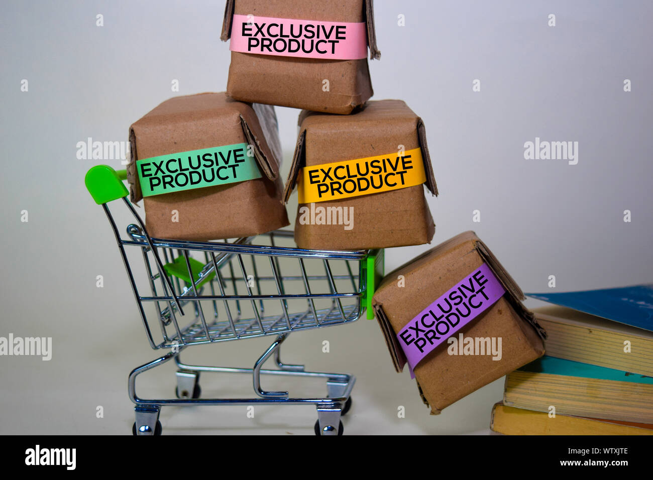 Exclusive Product Text in small boxes and shopping cart. Concepts about ...