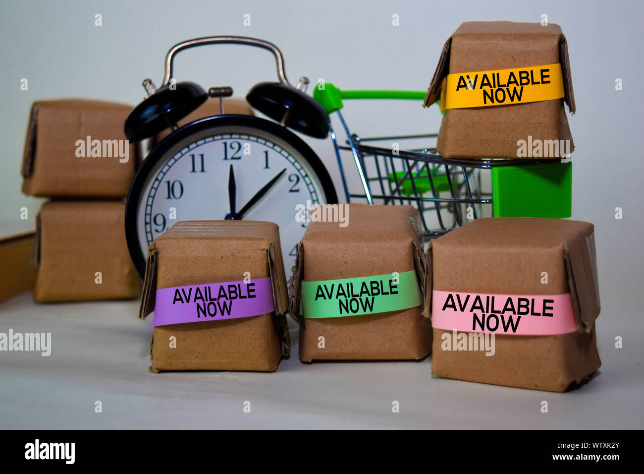 Available Now Text in small boxes and shopping cart. Concepts about ...