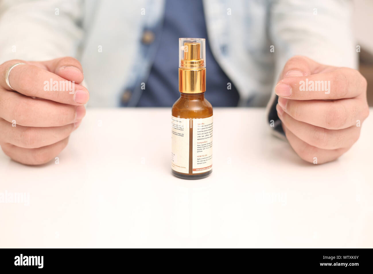 Picture of man liquid spray medicine bottle holding in hand. Isolated ...