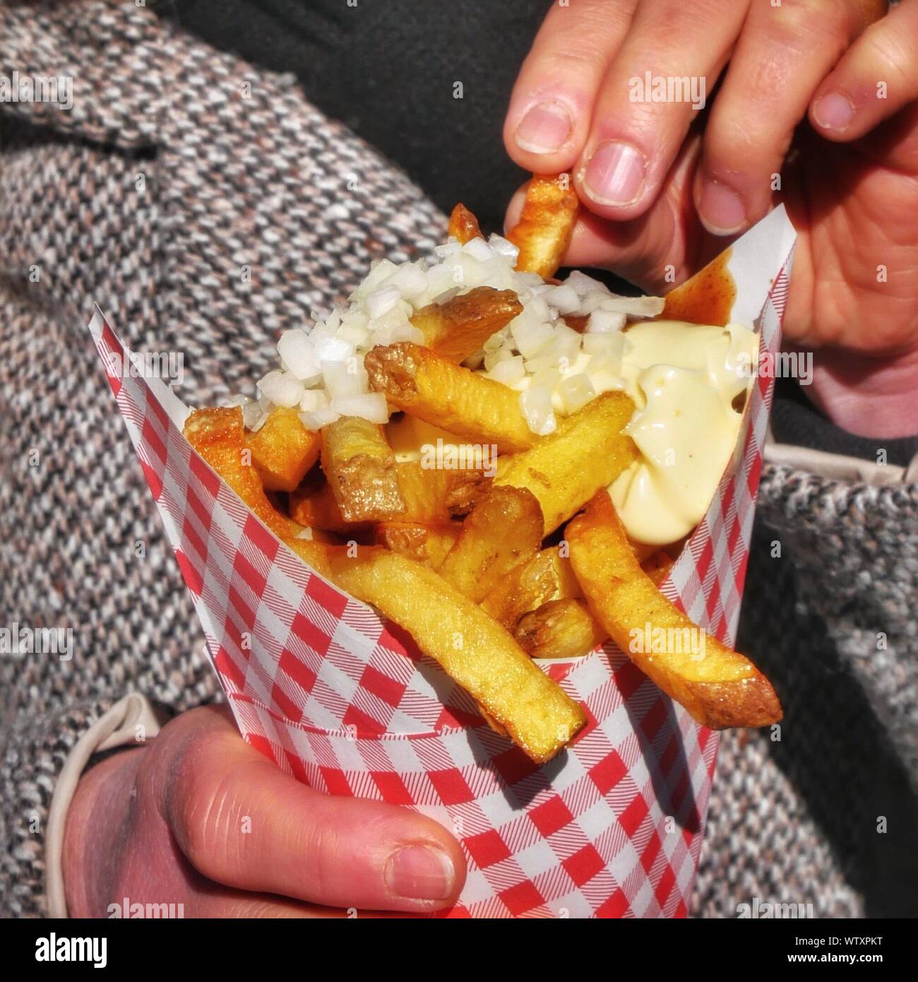 Holding french fries hi-res stock photography and images - Alamy
