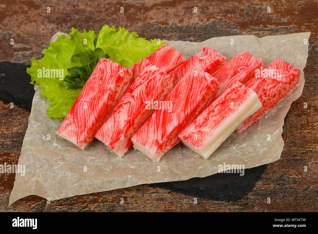 Crab surimi stick served salad leaves Stock Photo - Alamy