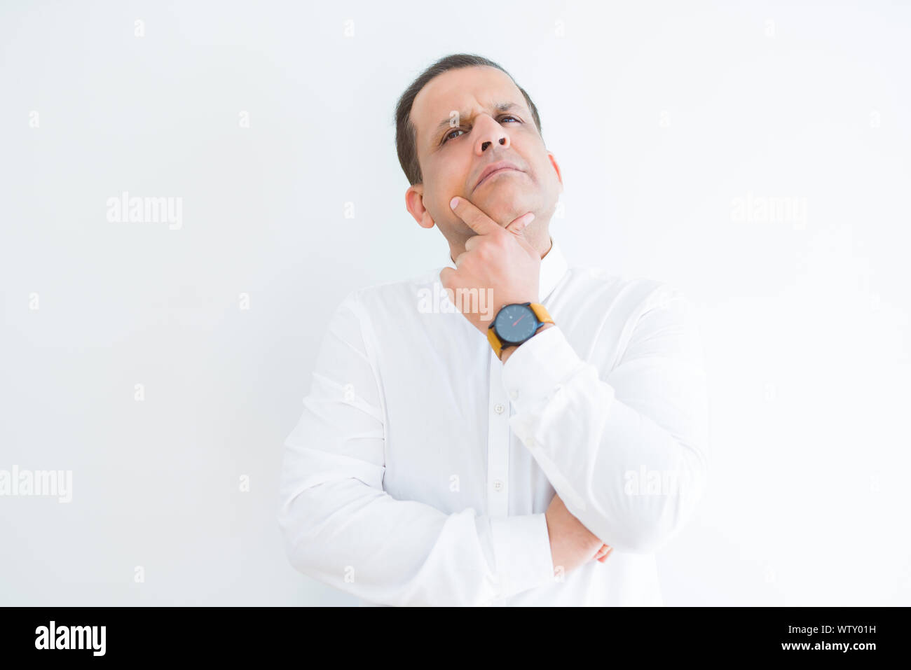 Middle age man thinking clueless about a question Stock Photo - Alamy