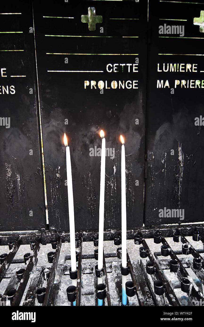 Lit candlestick hi-res stock photography and images - Alamy