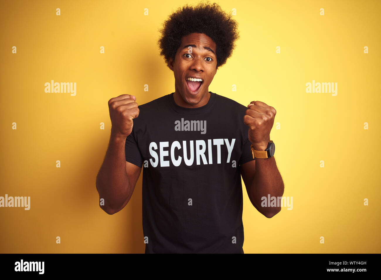 American safeguard man with afro hair wearing security uniform over ...