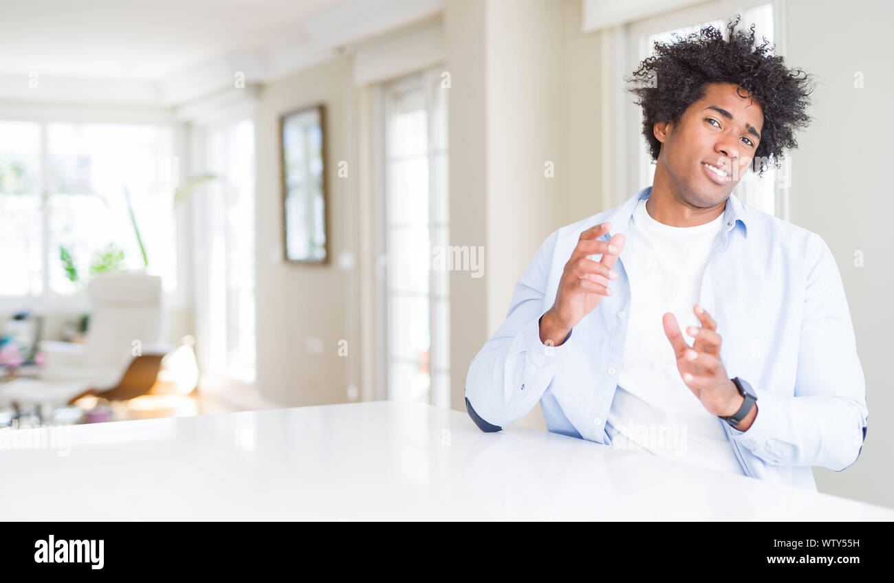 African American man at home disgusted expression, displeased and ...