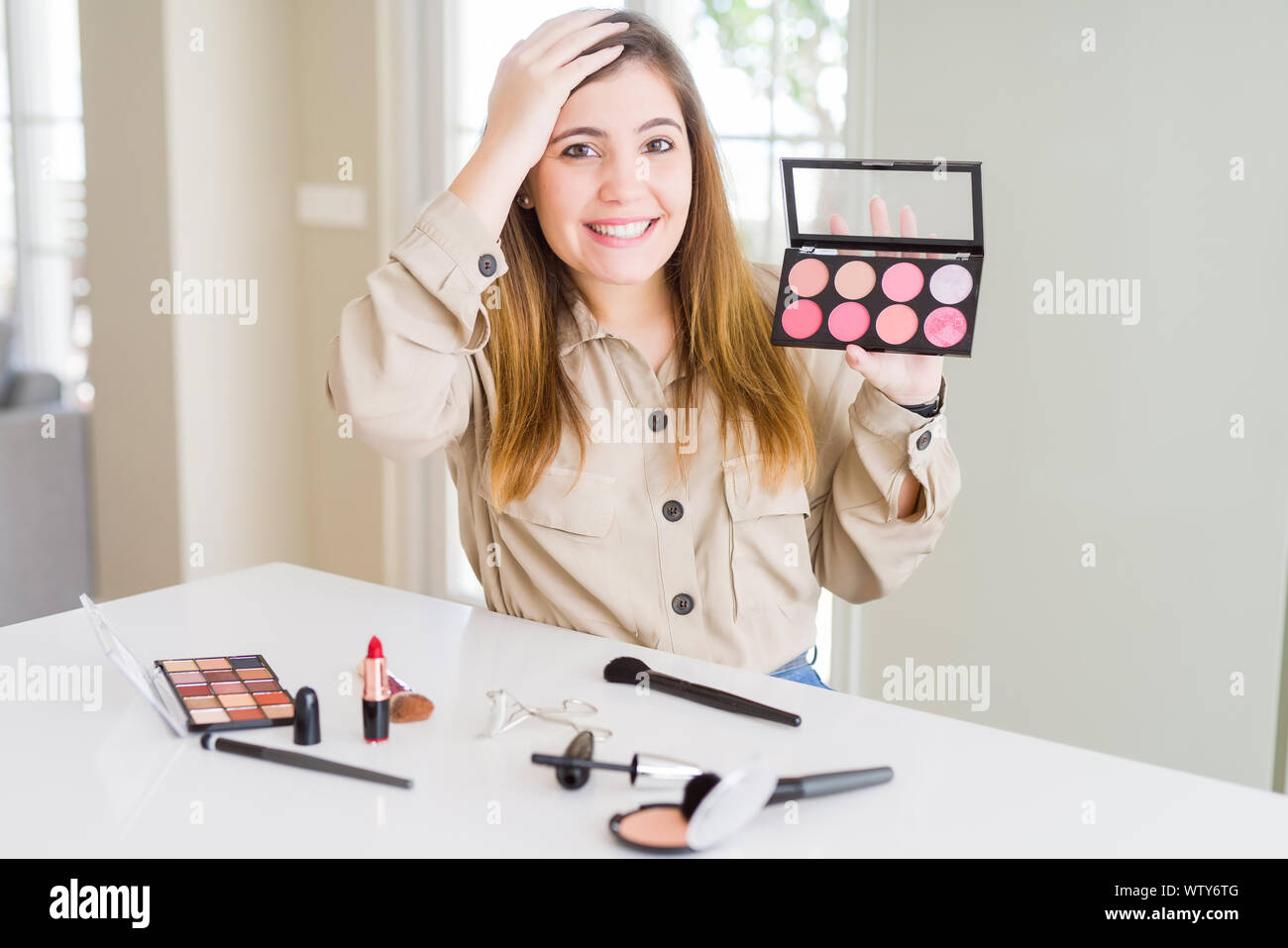 Applying makeup angry hi-res stock photography and images - Alamy