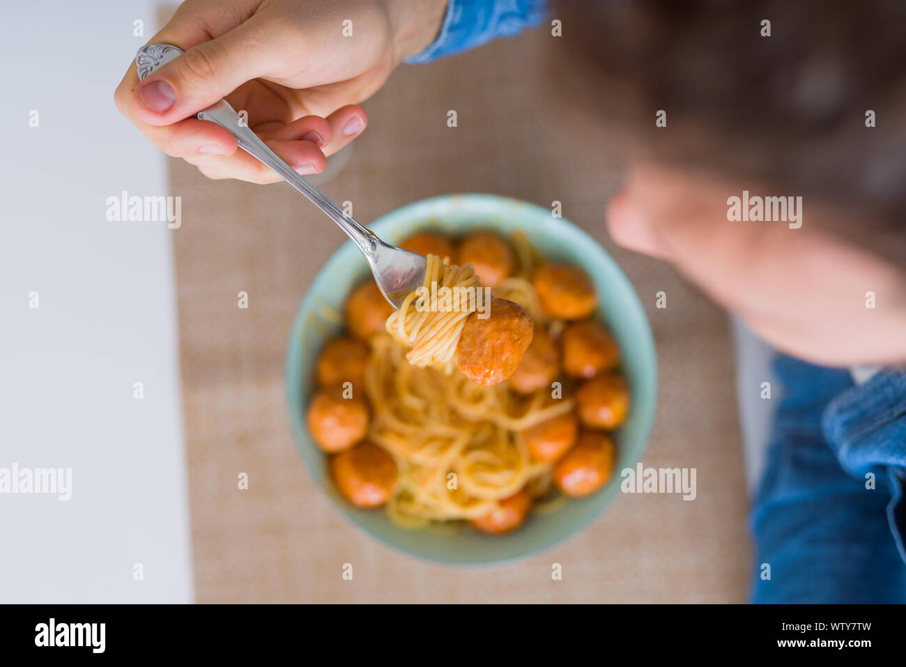 Close up man eating meatballs hi-res stock photography and images - Alamy