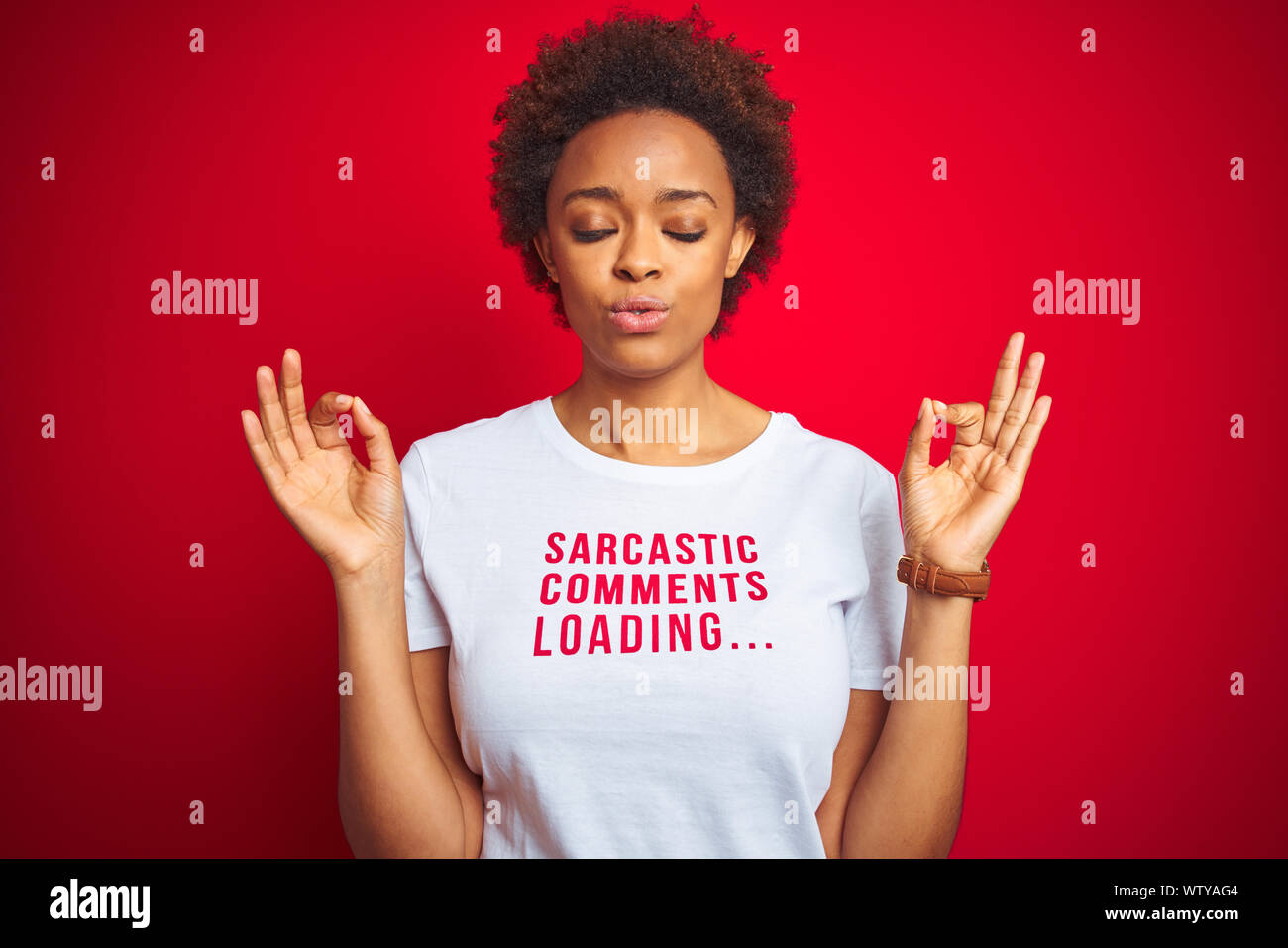 African american woman wearing sarcastic comments t-shirt over red ...