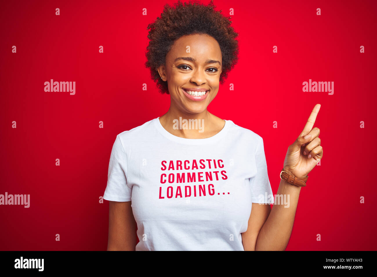 African american woman wearing sarcastic comments t-shirt over red ...